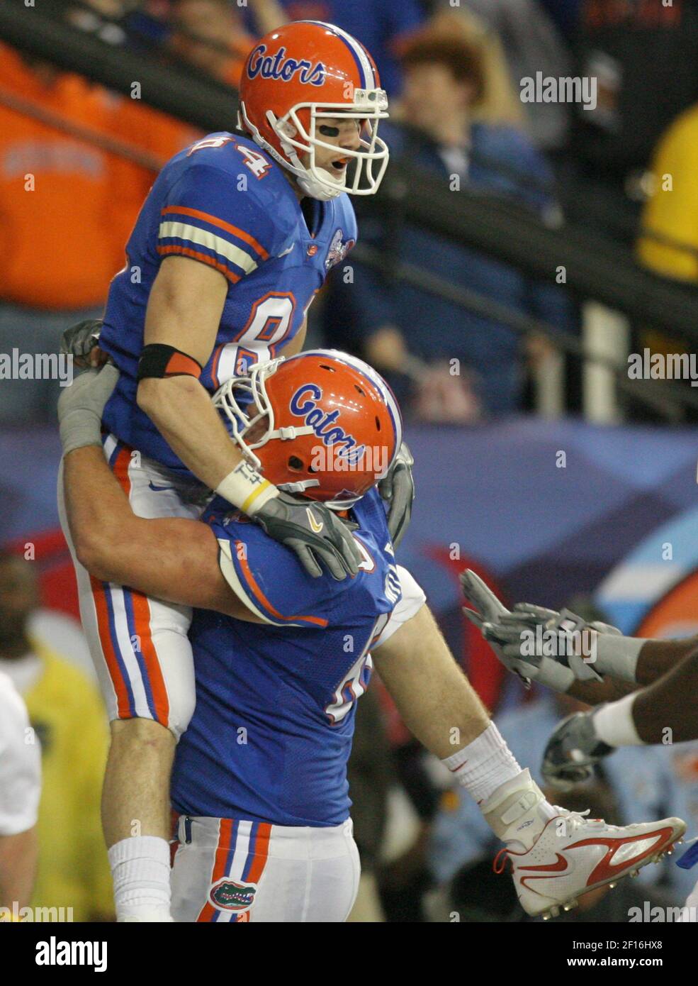 Florida's Tate Casey (84) and Drew Miller (67) celebrate Casey's second ...