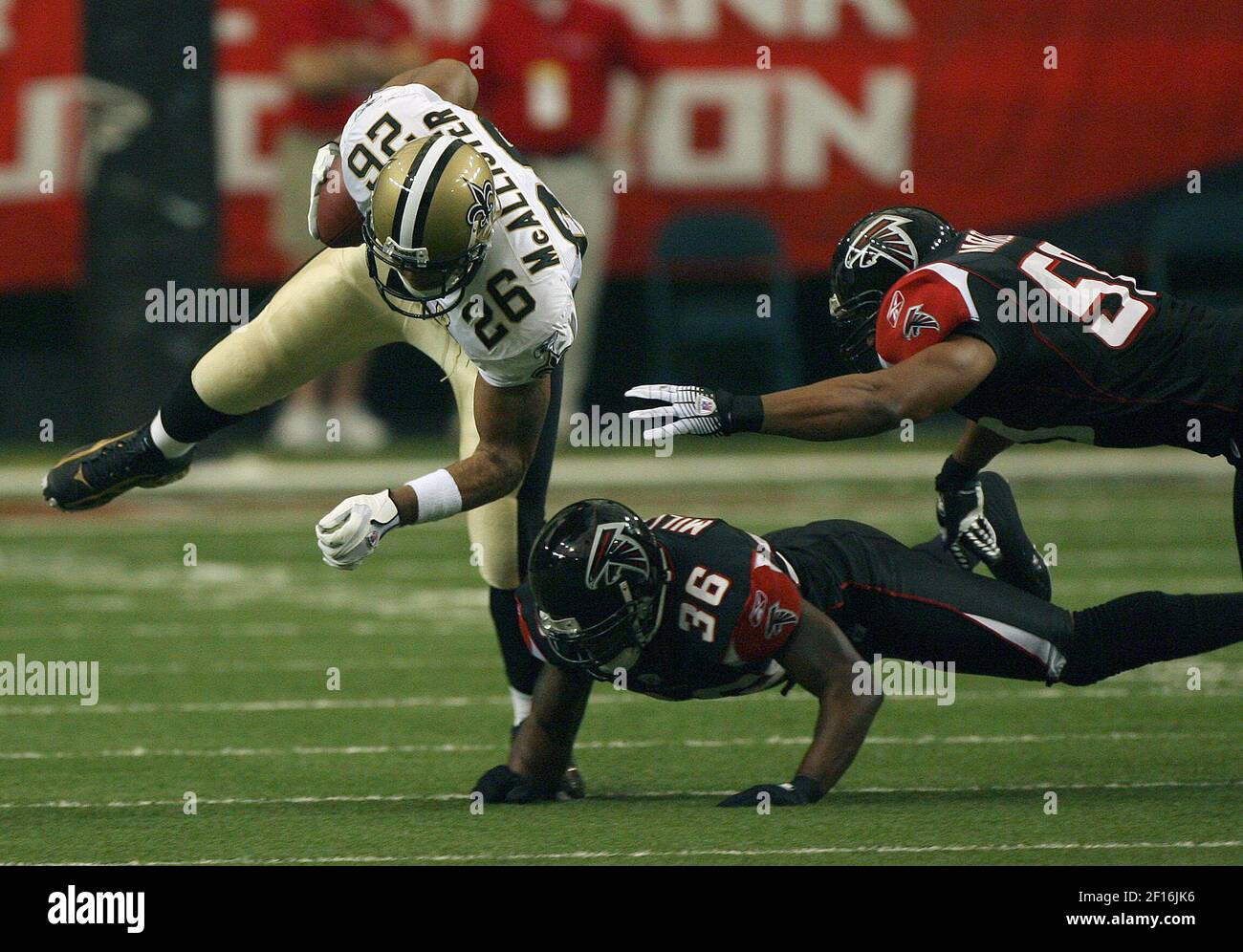 New Orleans Saints running back Deuce McAllister (26) keeps his balance ...