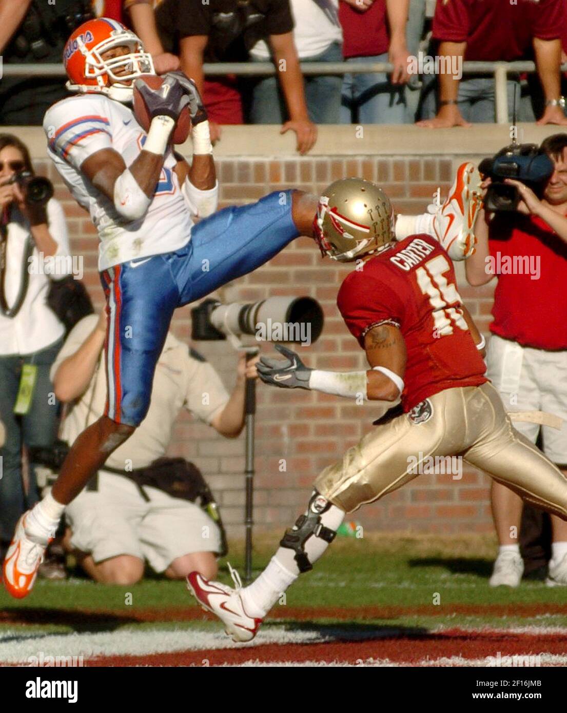 Florida wide receiver Dallas Baker leaps high to pull in the winning ...
