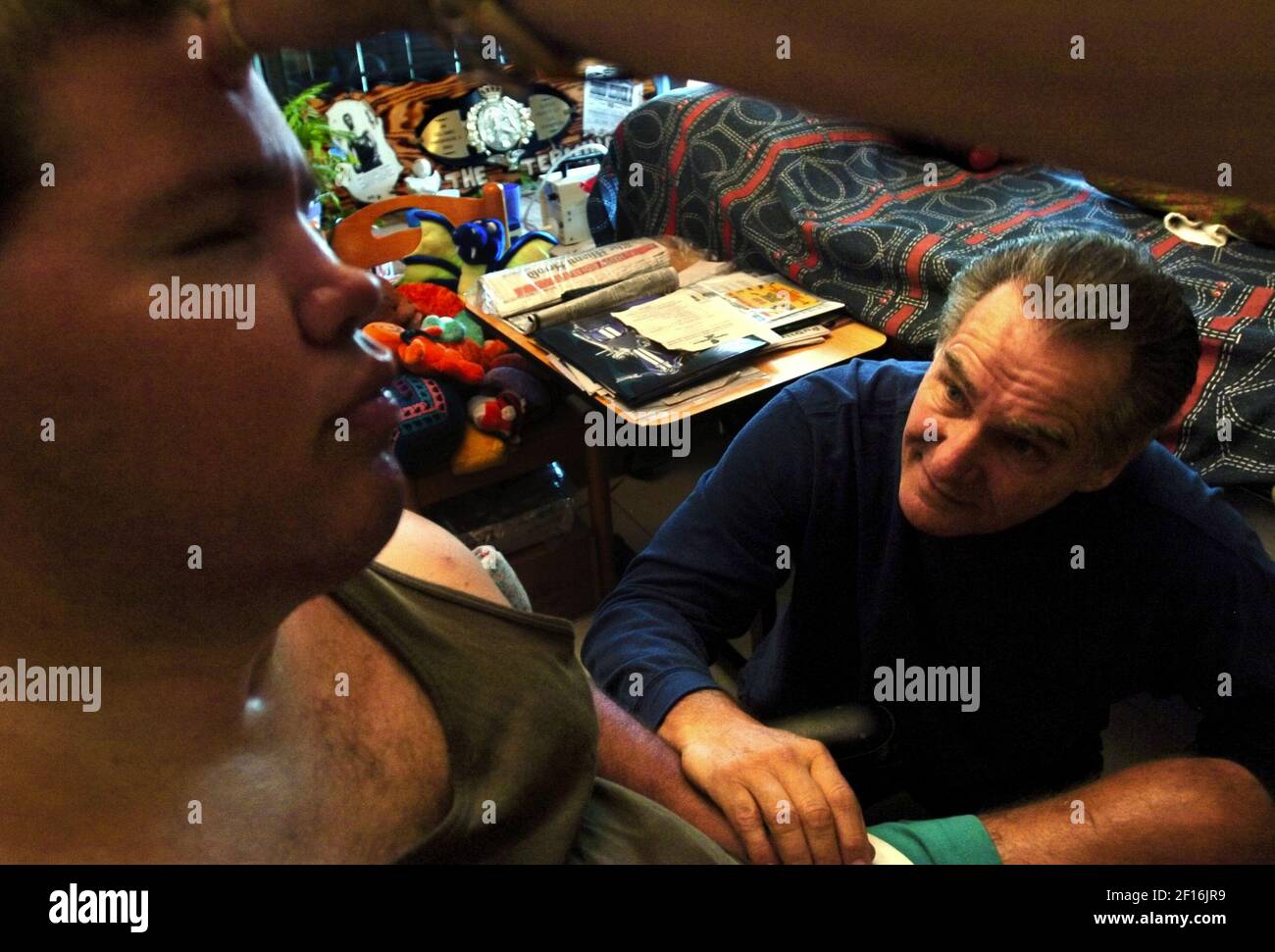 Lou Sanchez, right, tries to get the attention of former champion ...