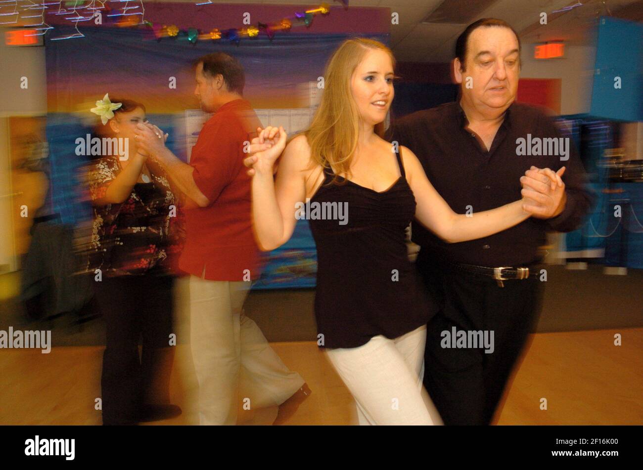 Lania Dowers instructs Dan Hallesy at Arthur Murray Studios in Orlando ...