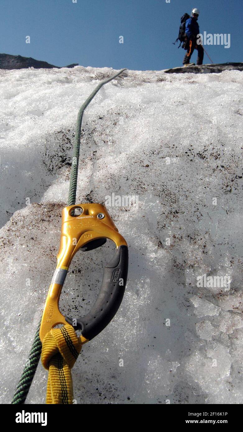 Climbers use ascenders to help scale ice faces on the Nisqually Glacier ...