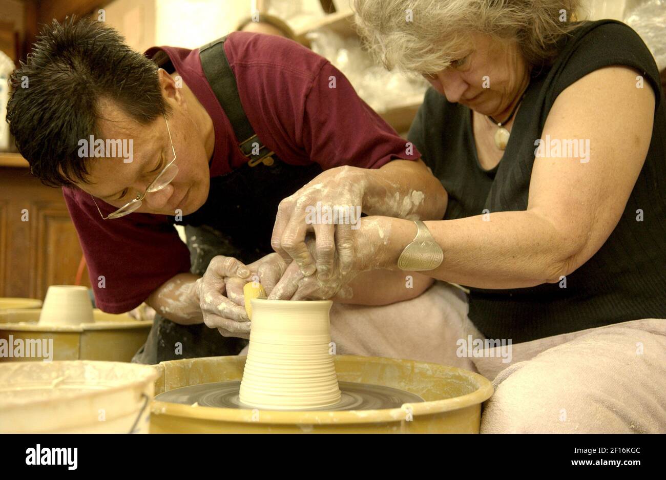 Reporter Mary Daniels gets a helping hand from instructor Fong Choo at ...