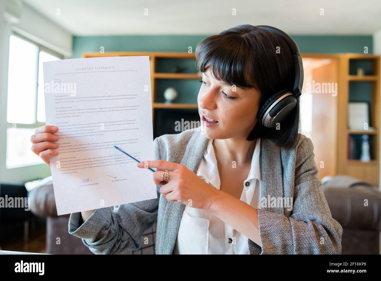 Business woman on video call from home Stock Photo - Alamy