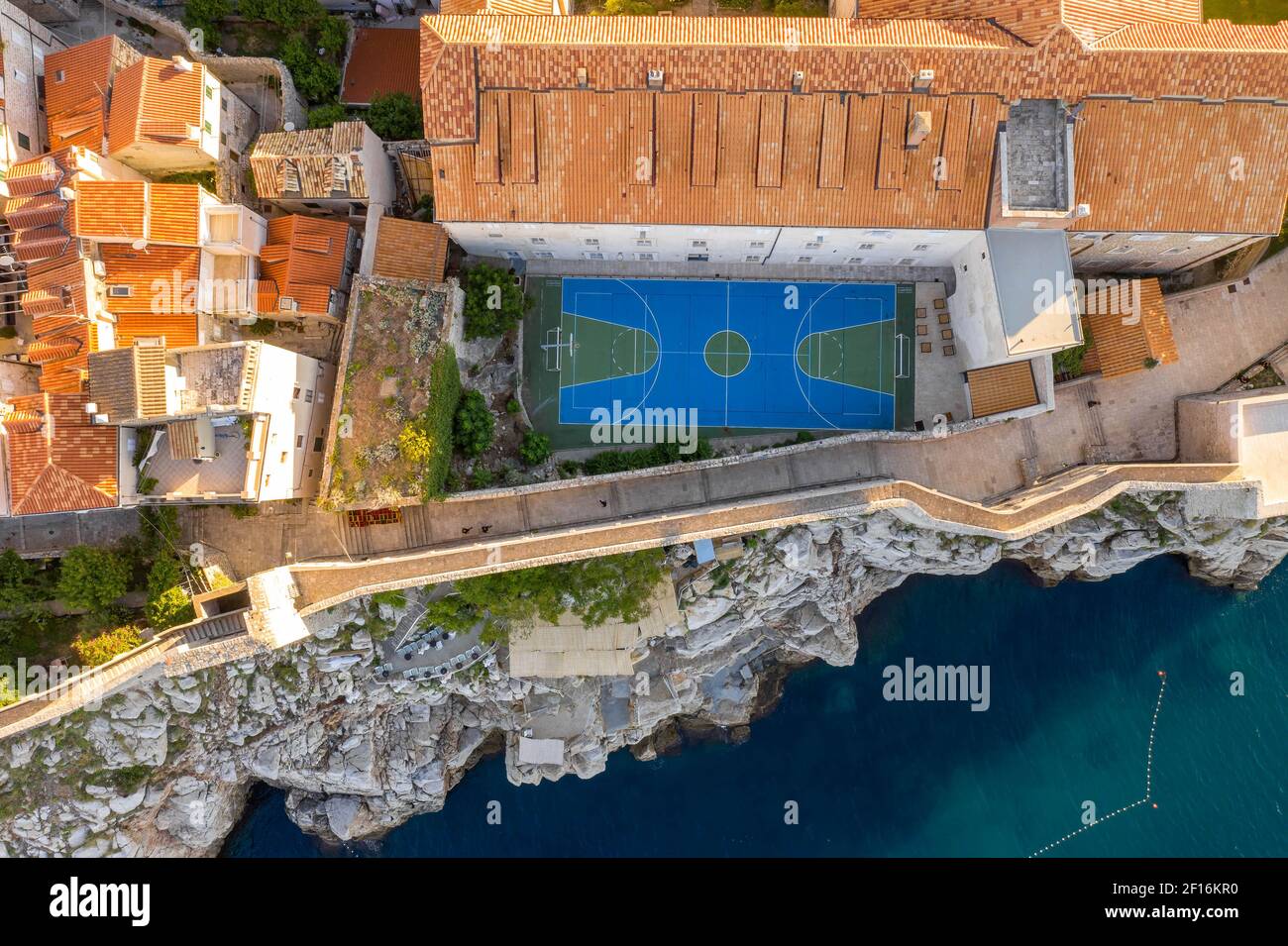 Aerial overhead drone shot of basketball court in Dubrovnik city wall ...