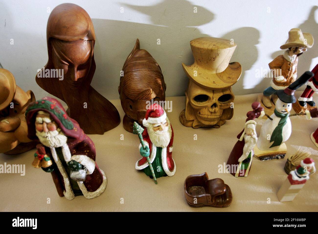 Examples of items carved by class participants are on display during a ...