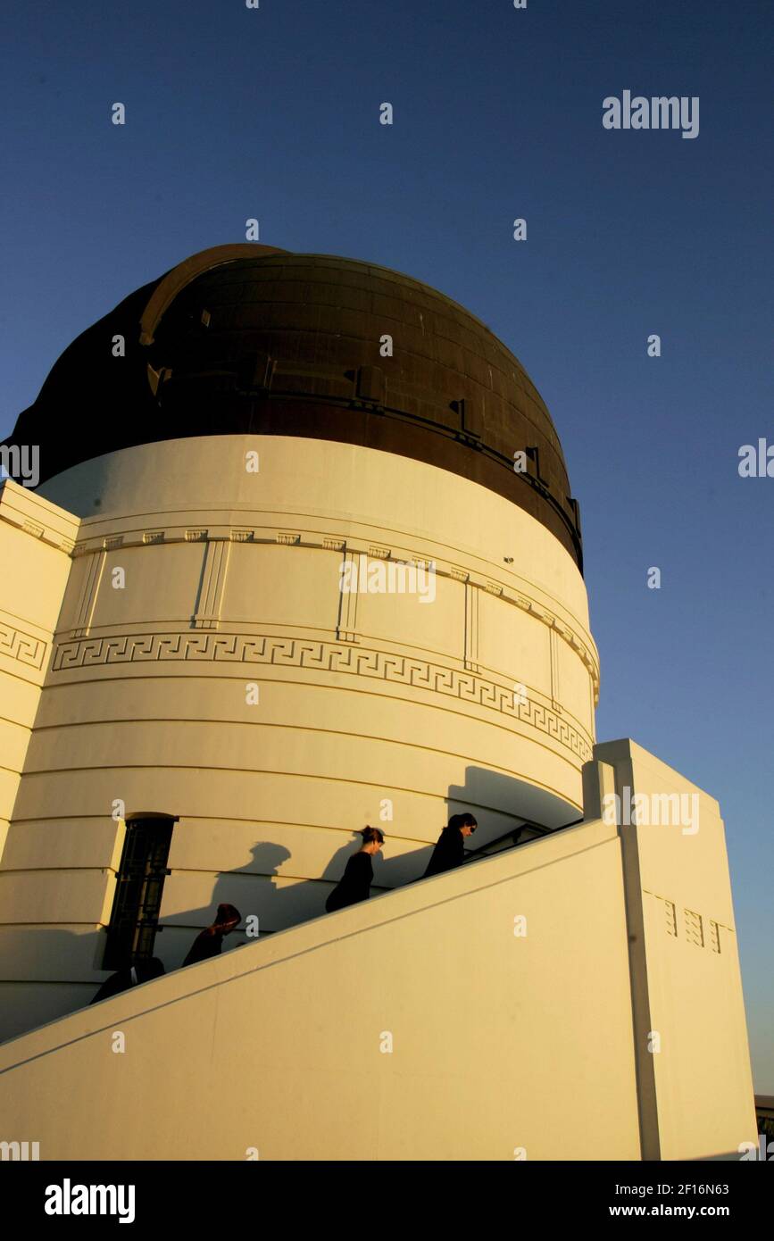 Visitors at the Griffith Observatory climb the stairs beneath the west ...