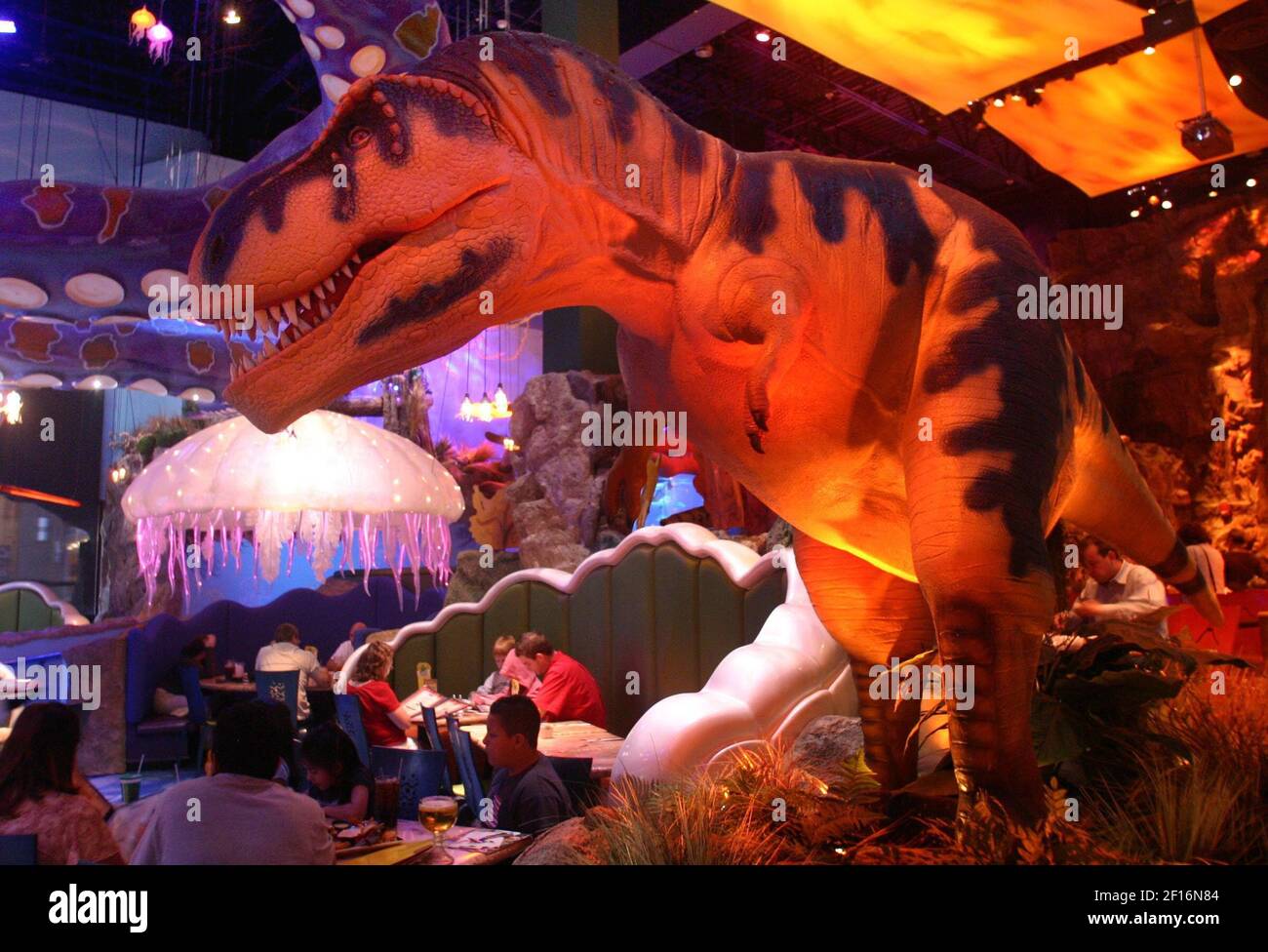 Guests at the new T-Rex Cafe near Kansas City, Missouri, dine amid ...