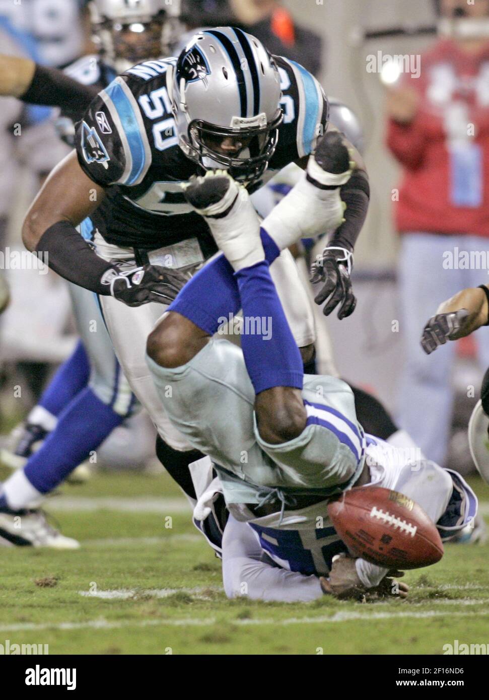 Dallas Cowboys' Tyson Thompson loses the ball in front Carolina ...