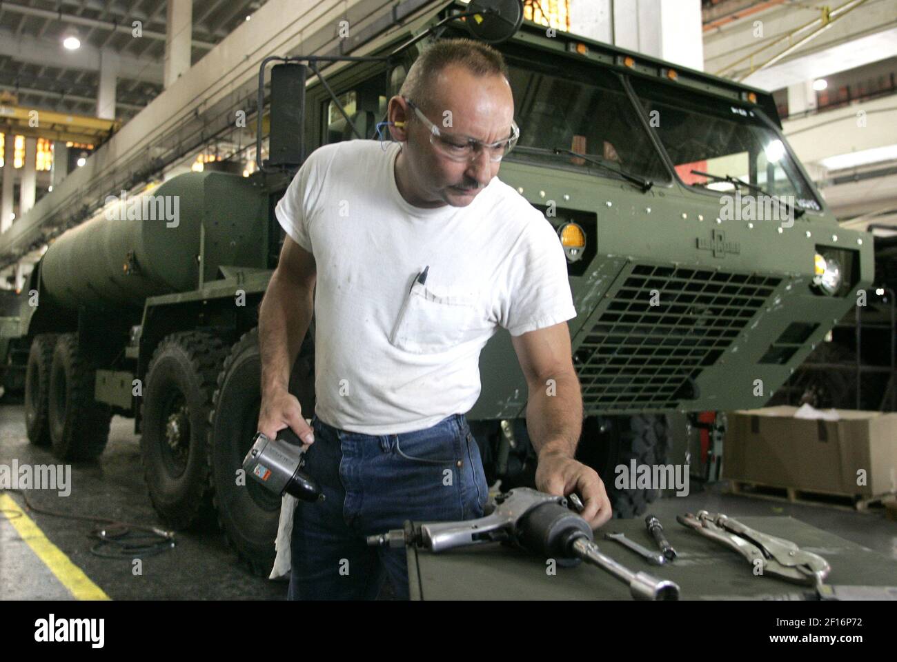 Ricky Vaught gathers tools to work on the HEMTT (Heavy Expanded ...