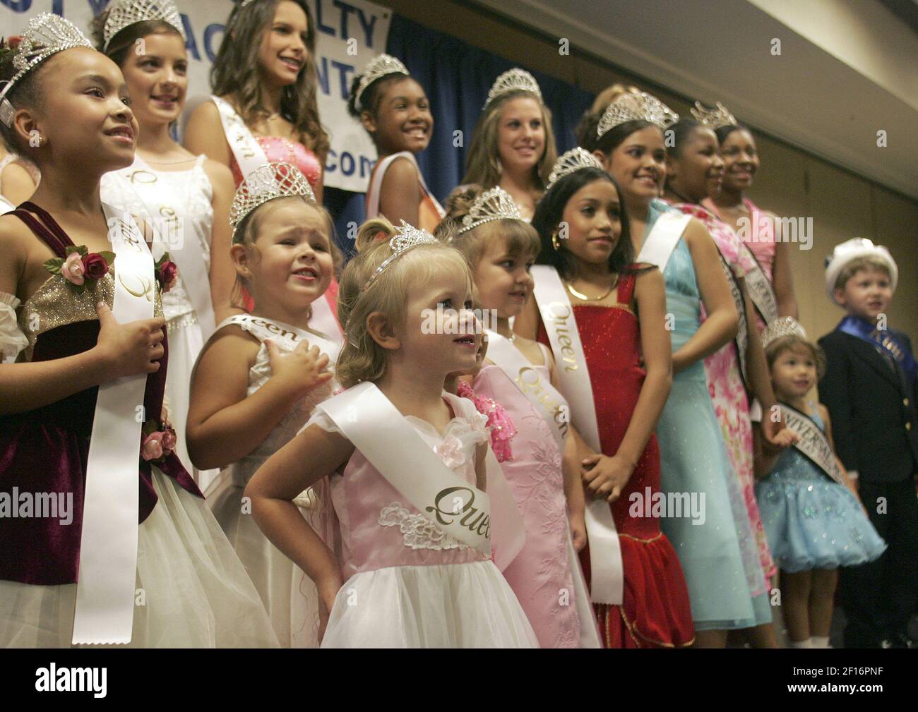 The Queens named in each age division pose for a group photo at the ...