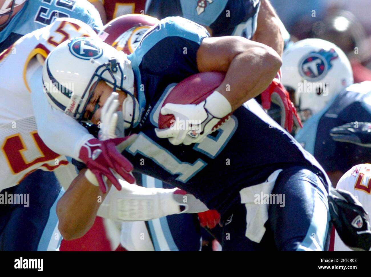 Tennessee Titans wide receiver Bobby Wade is brought down by Washington ...