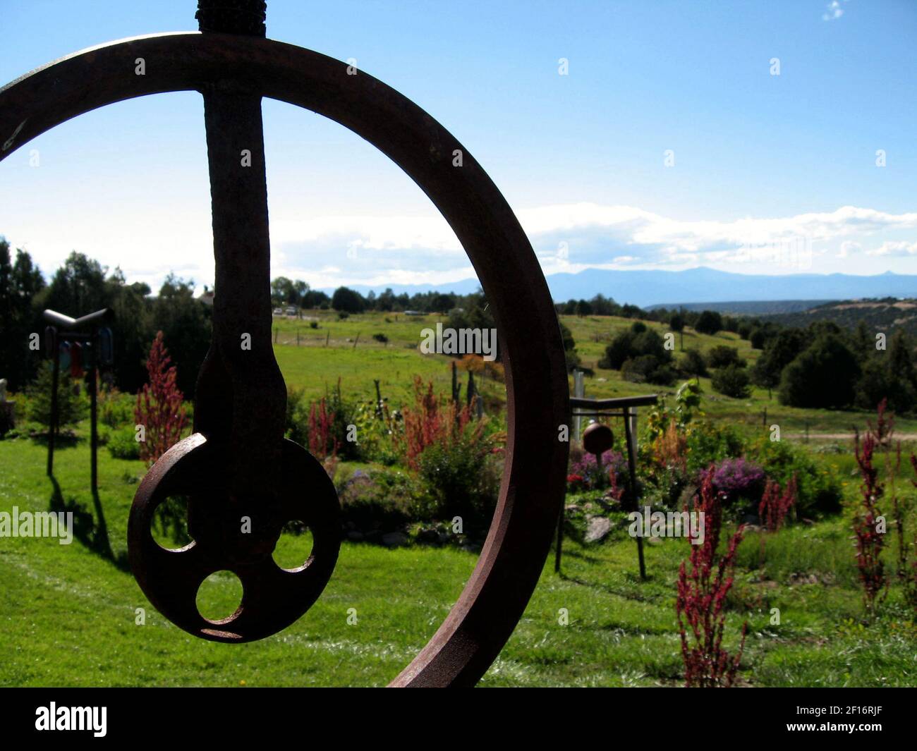 Bill G. Loyd's sculpture frames the gardens and mountains beyond at ...