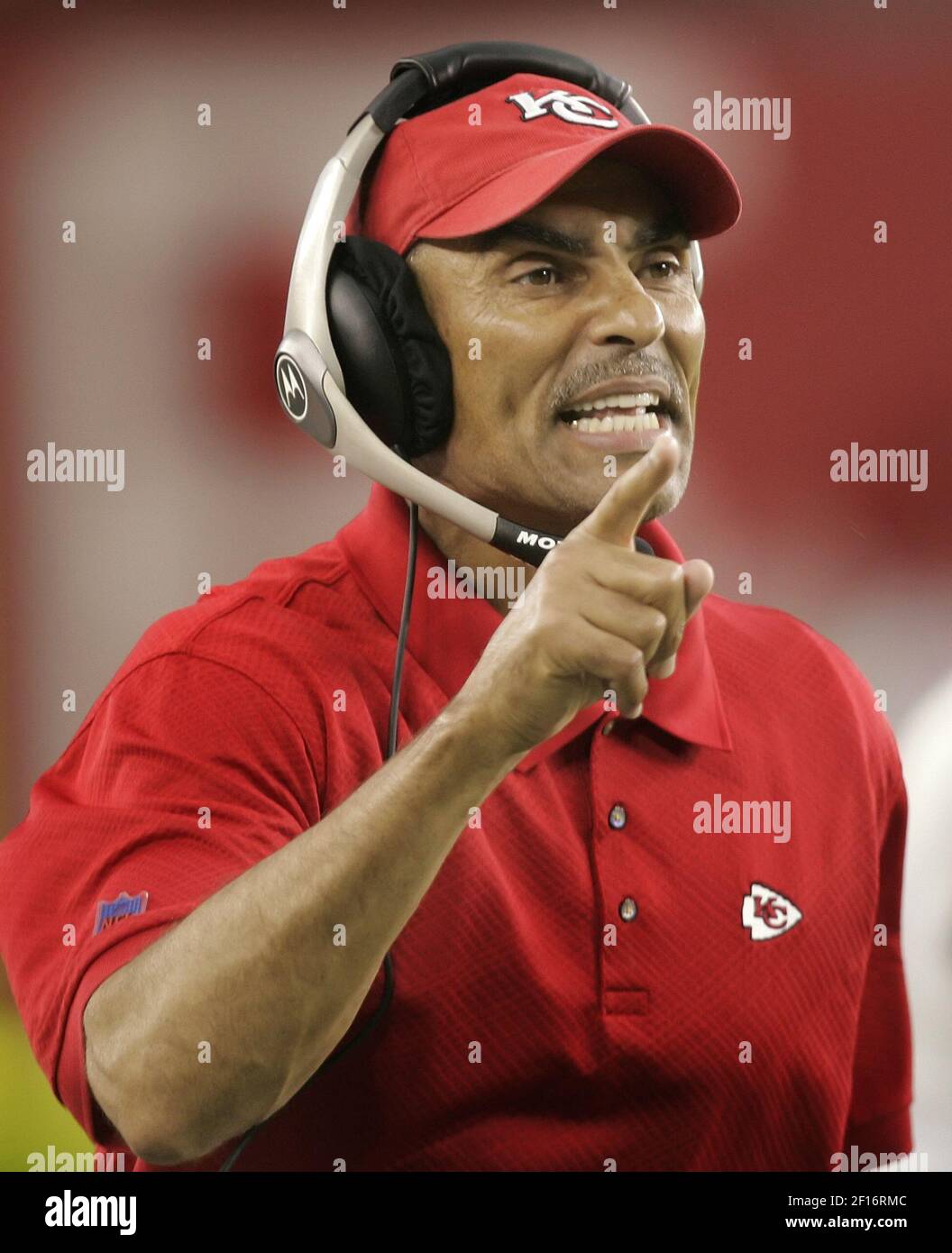 Kansas City Chiefs head coach Herm Edwards pointed to an official ...