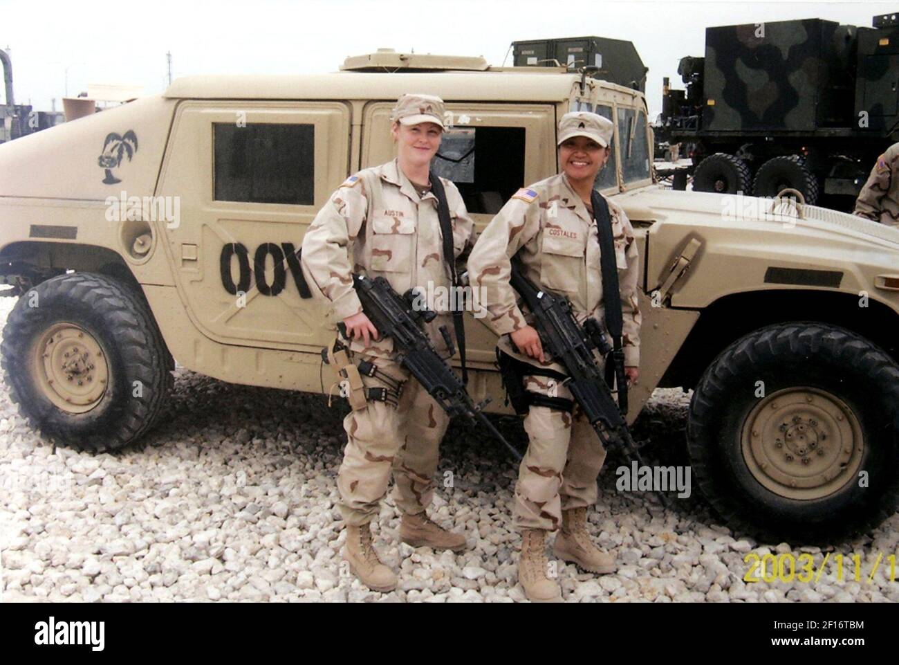U.S. Army Sgt. Sandi Austin, left, is pictured with Lala Pitts, right ...