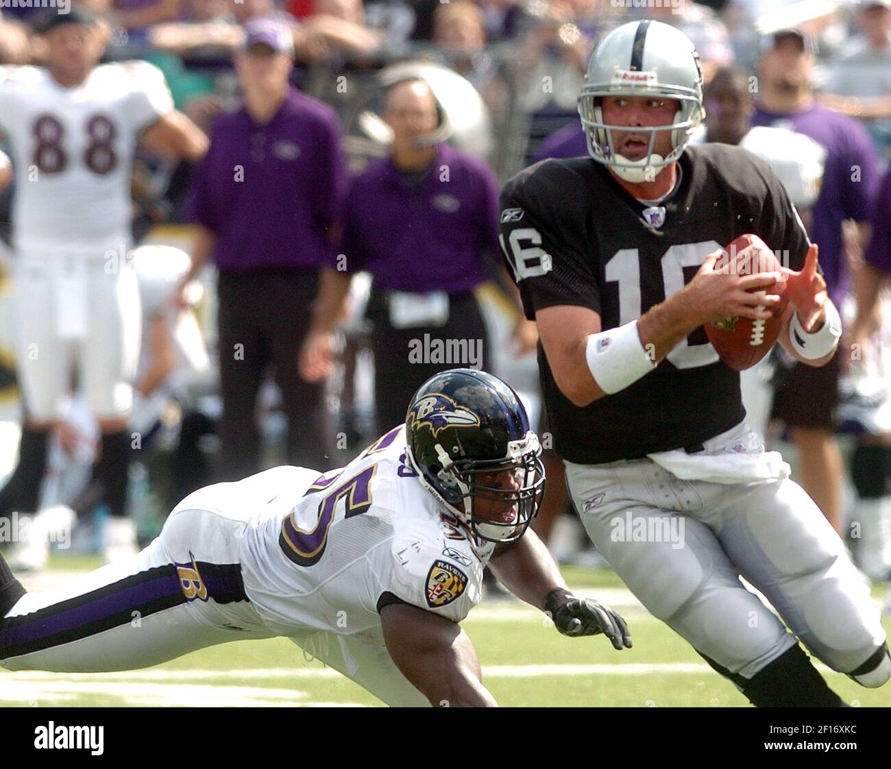 Oakland Raiders' quarterback Andrew Walter (16) scrambles away from the ...