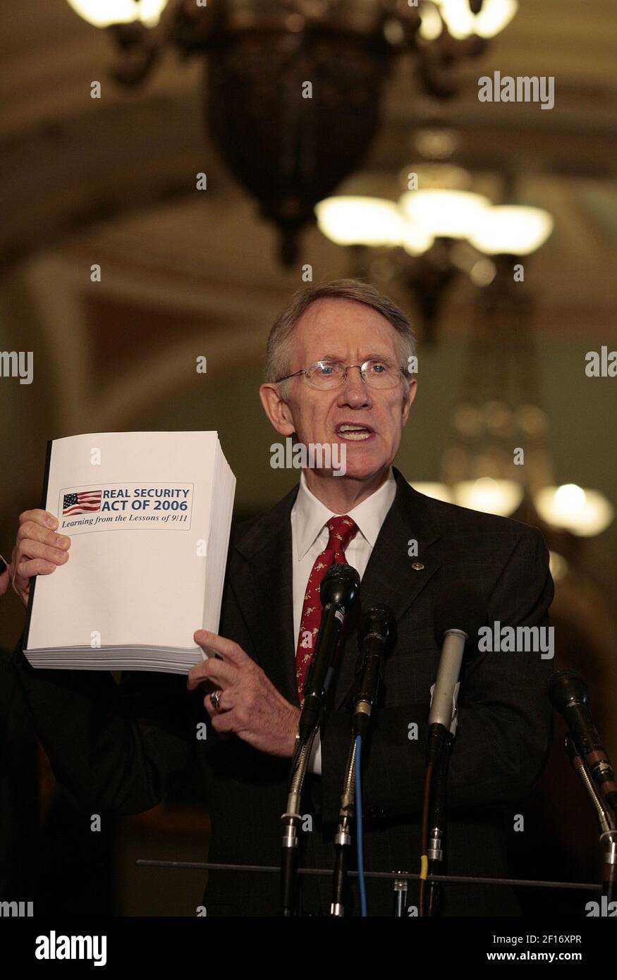 Sen. Harry Reid (D-NV) talks to reporters following party policy ...