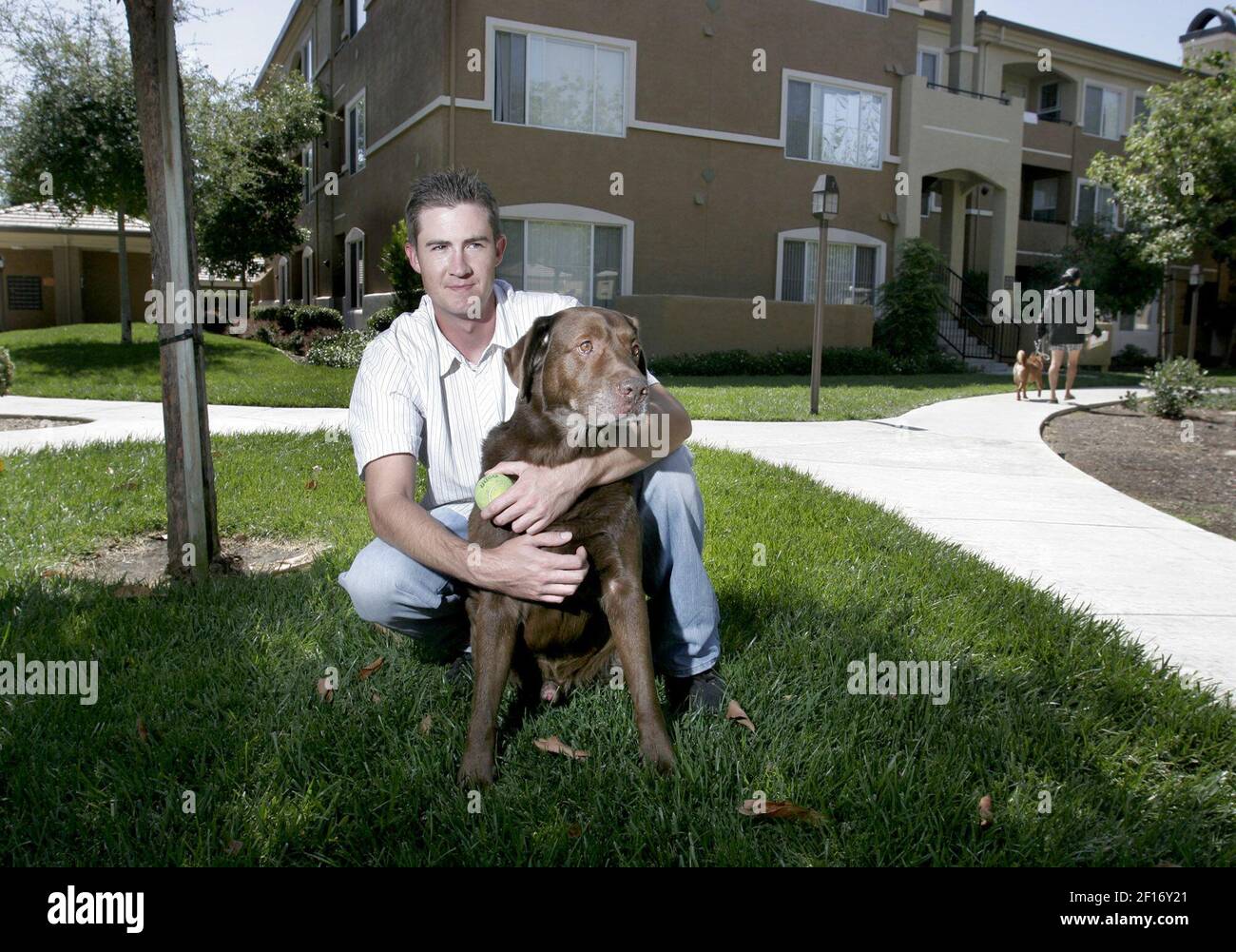 Greg McGowan pays pet rent for his dog, "Niles," at the Alborada ...
