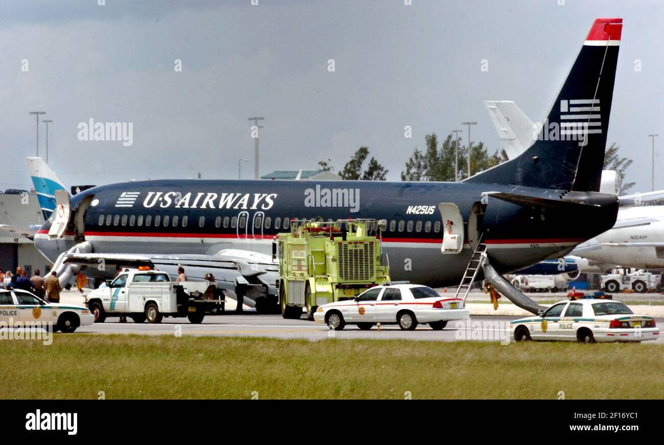 Miami-Dade Fire Rescue Aviation Units put out a fire from a US Airways ...