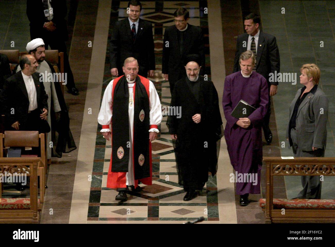 Former Iranian President Mohammad Khatami (center) arrives at the ...