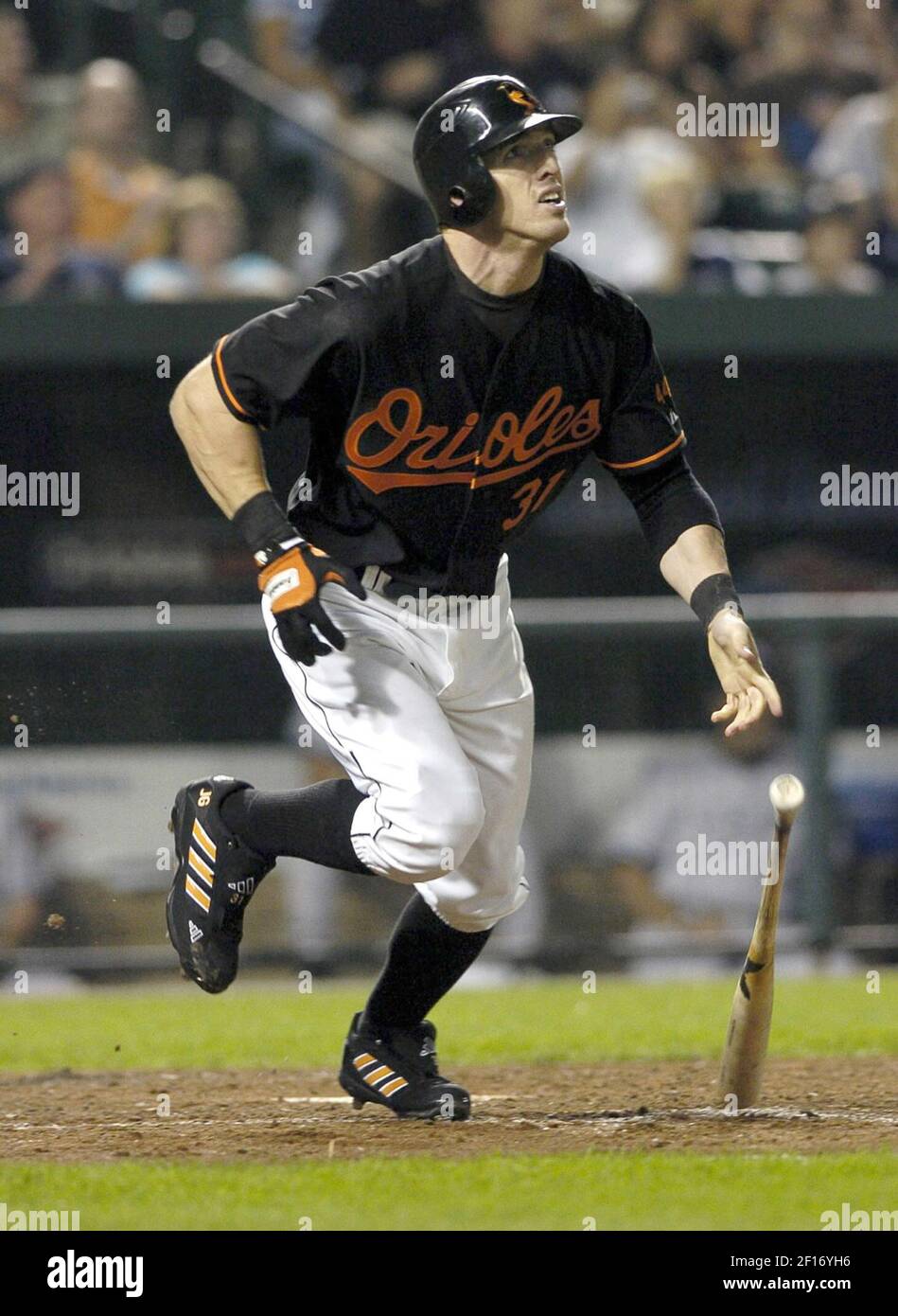 Baltimore Orioles' Jay Gibbons watches his three-run home run against ...
