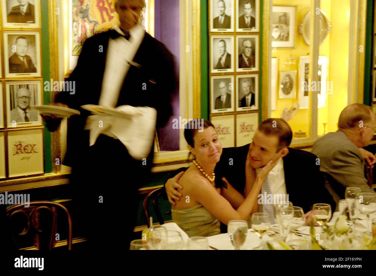 Waiter Cedric Davis, left, serves Stacie Hollisk and Benjamin Jacobs ...