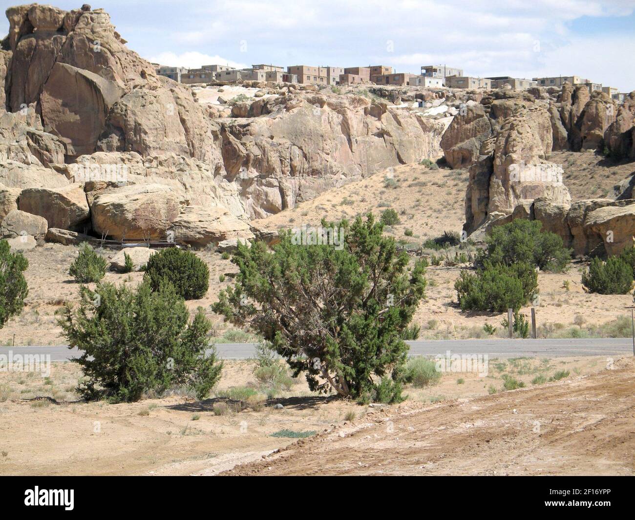 Acoma Pueblo sits atop a 370-foot high mesa in the high desert of ...