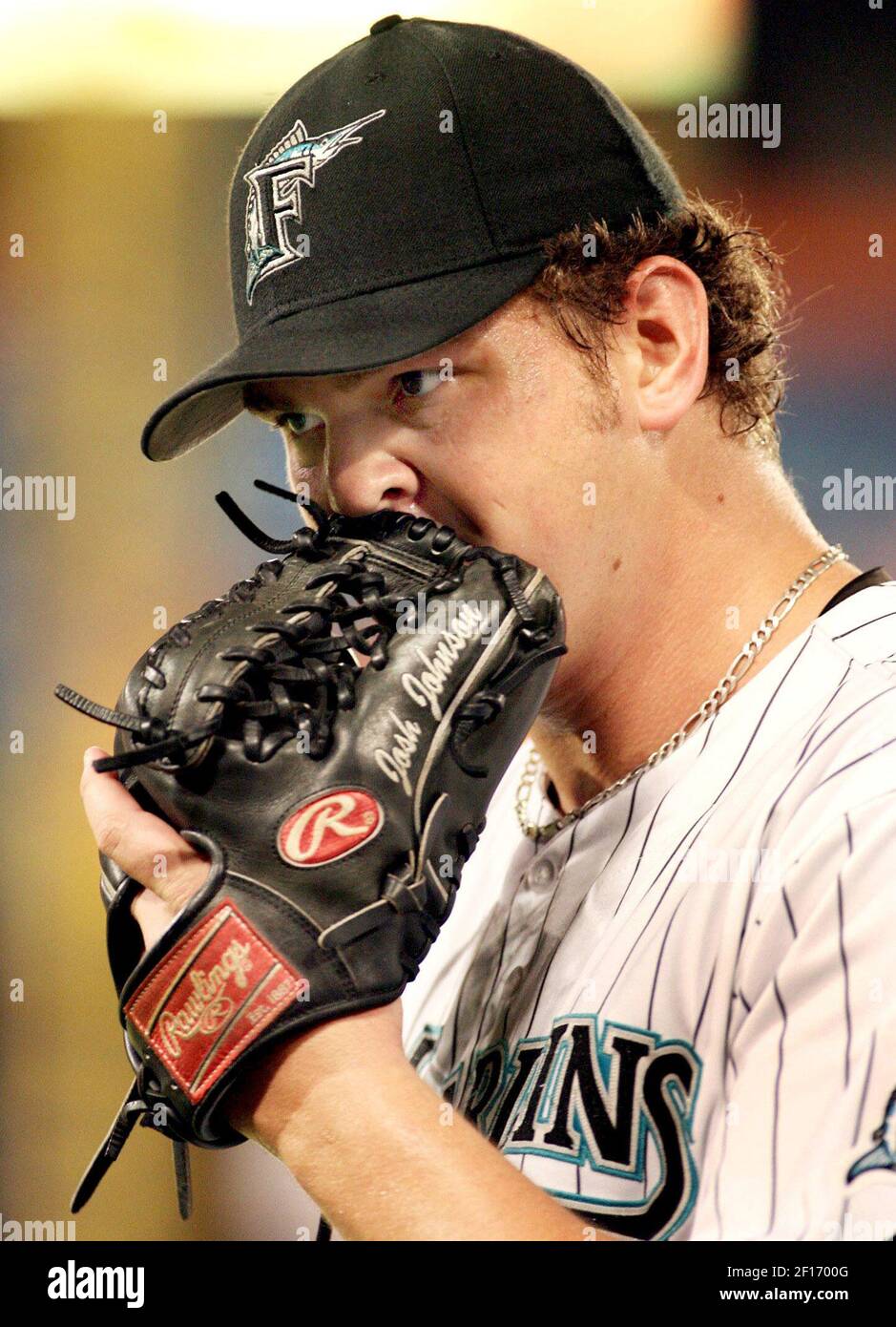 Florida Marlins pitcher Josh Johnson reacts as he exits the field after ...