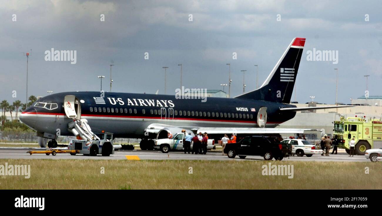 Miami-Dade Fire Rescue Aviation Units put out a fire from a US Airways ...