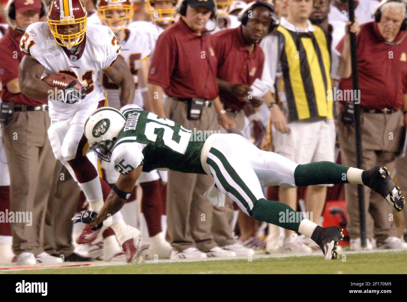 The Washington Redskins' Rock Cartwright (31) is knocked out of bounds ...