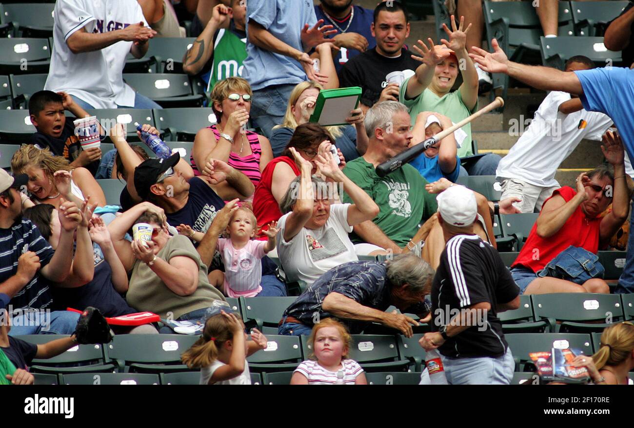 A bat slips from the grasp of Cleveland Indians batter Kelly Shoppach ...