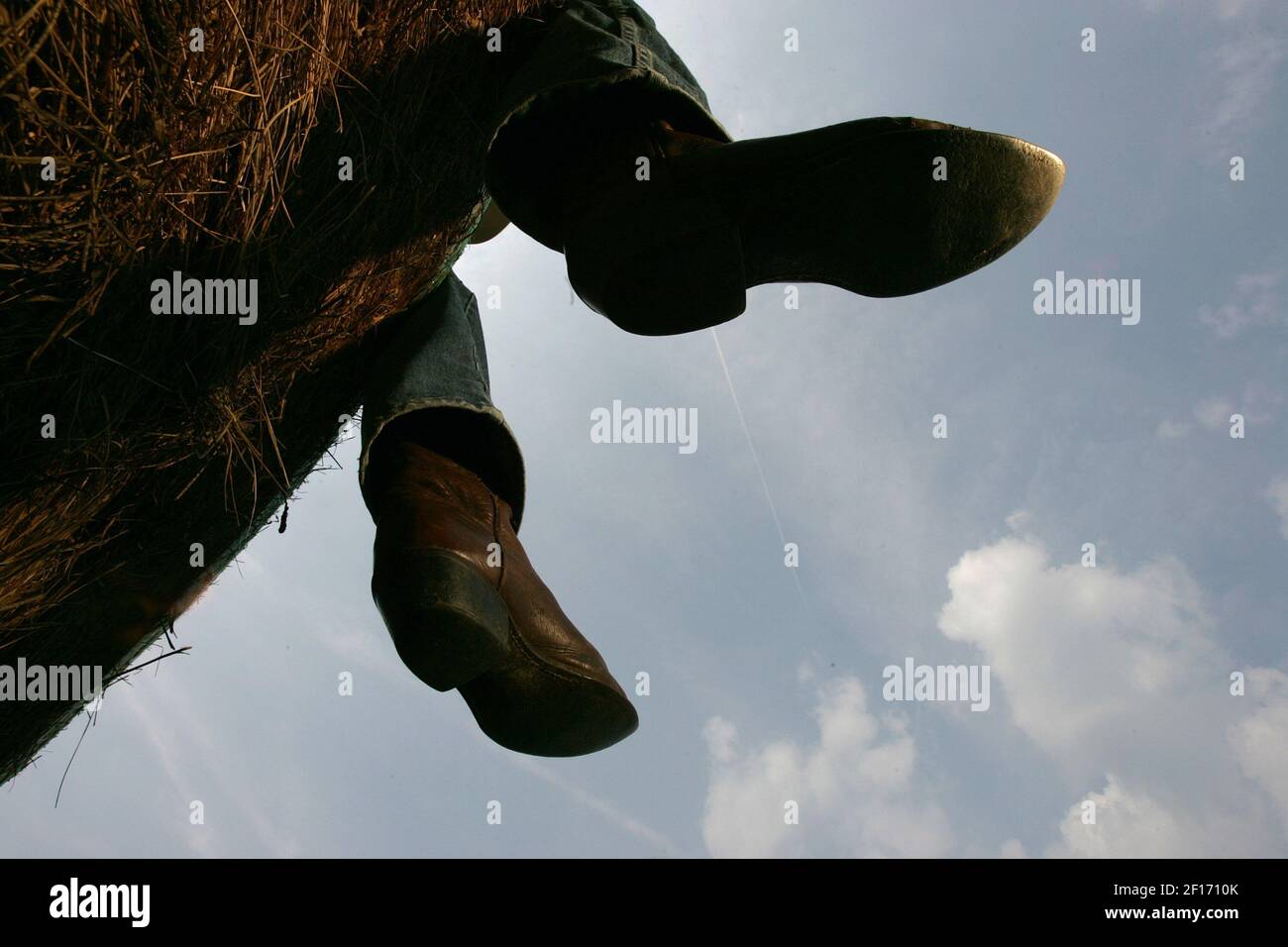The cowboy boots of Dave Hutchins, a West Mansfield, Ohio, native who ...