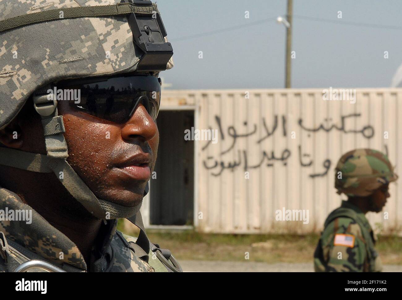 Lt. Michael Williams, Jr., left, listens during training as reserve and ...
