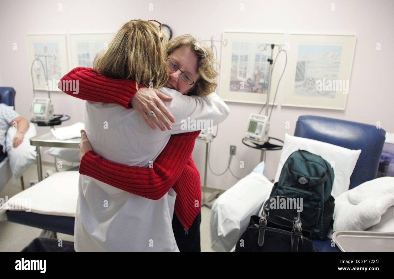 Karen Kelso hugs nurse Marion Ioli after her five-hour long monthly ...