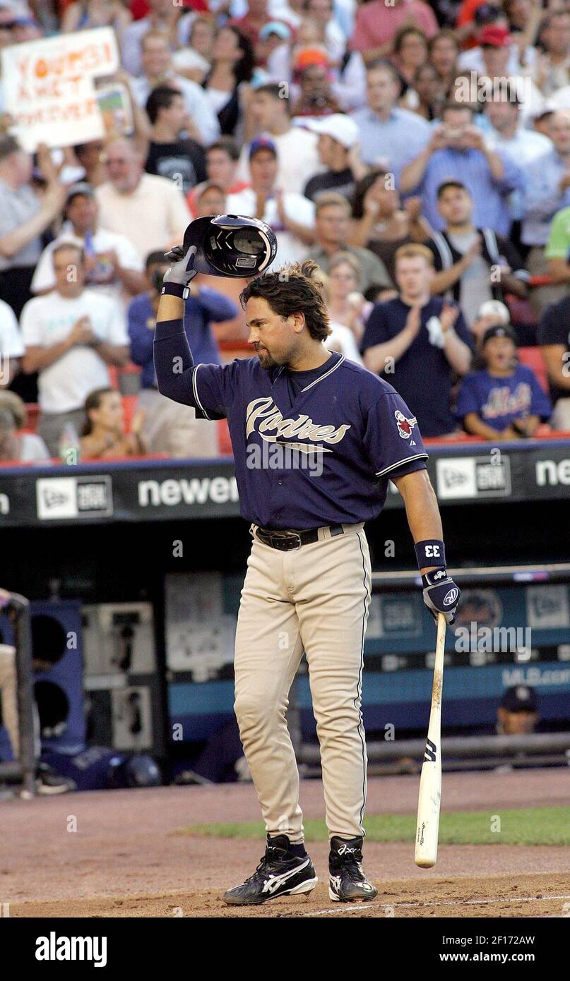 San Diego Padres' Mike Piazza tips his batting helmet to the crowd ...
