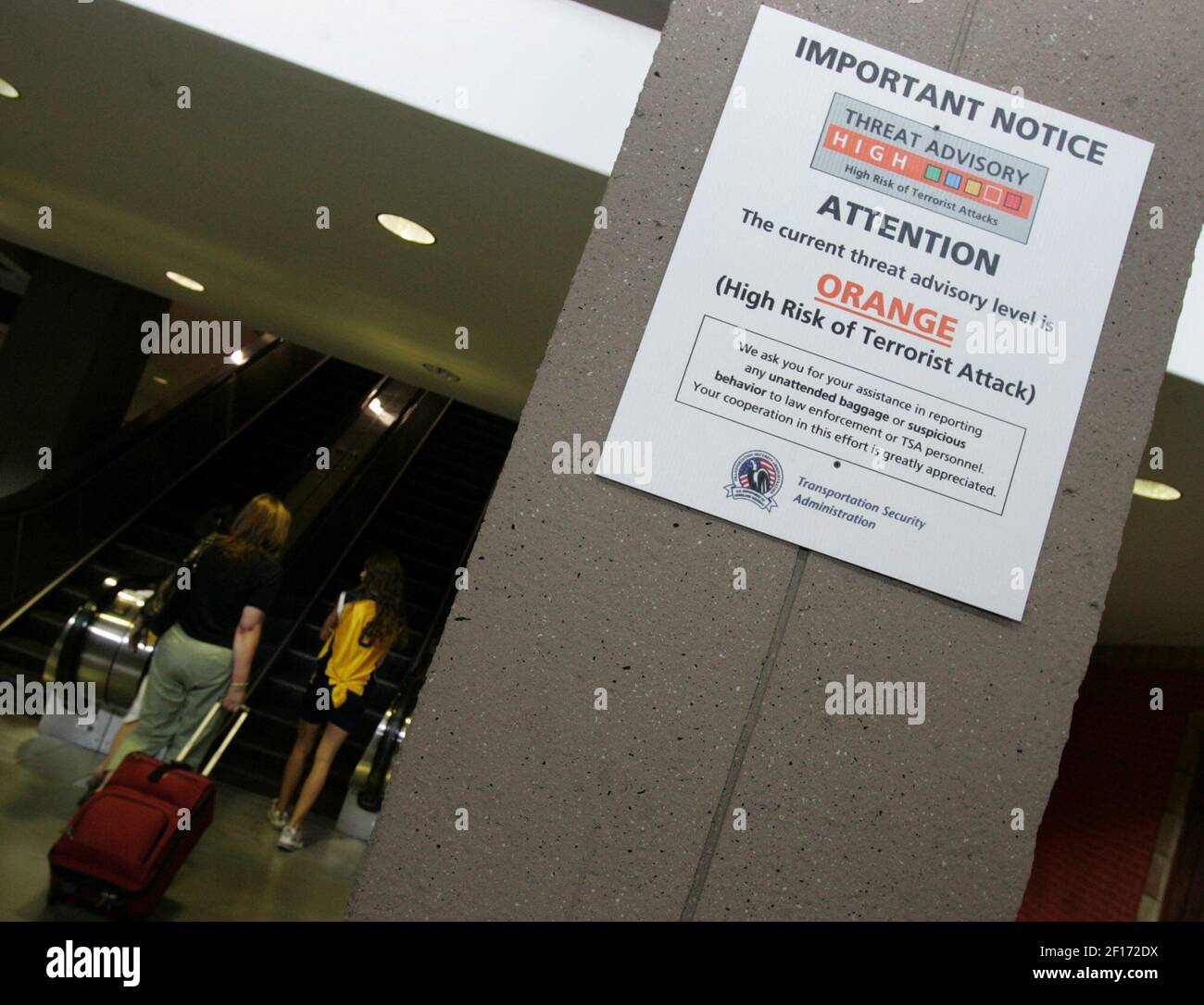 A sign informing passengers about the increased terrorist attack alert ...