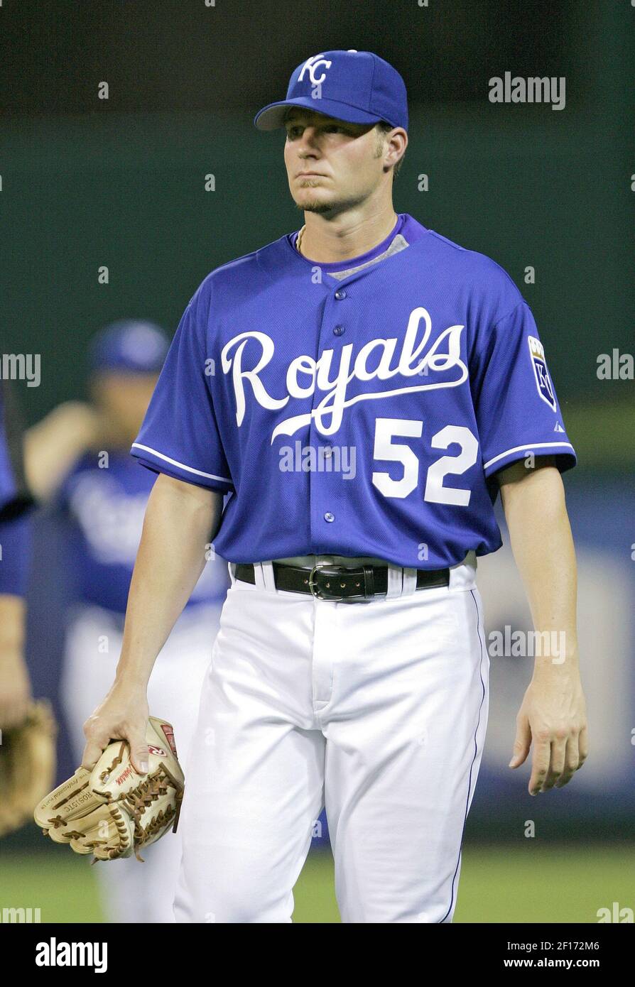 Kansas City Royals' newly acquired pitcher Scott Dohmann (52) walks ...