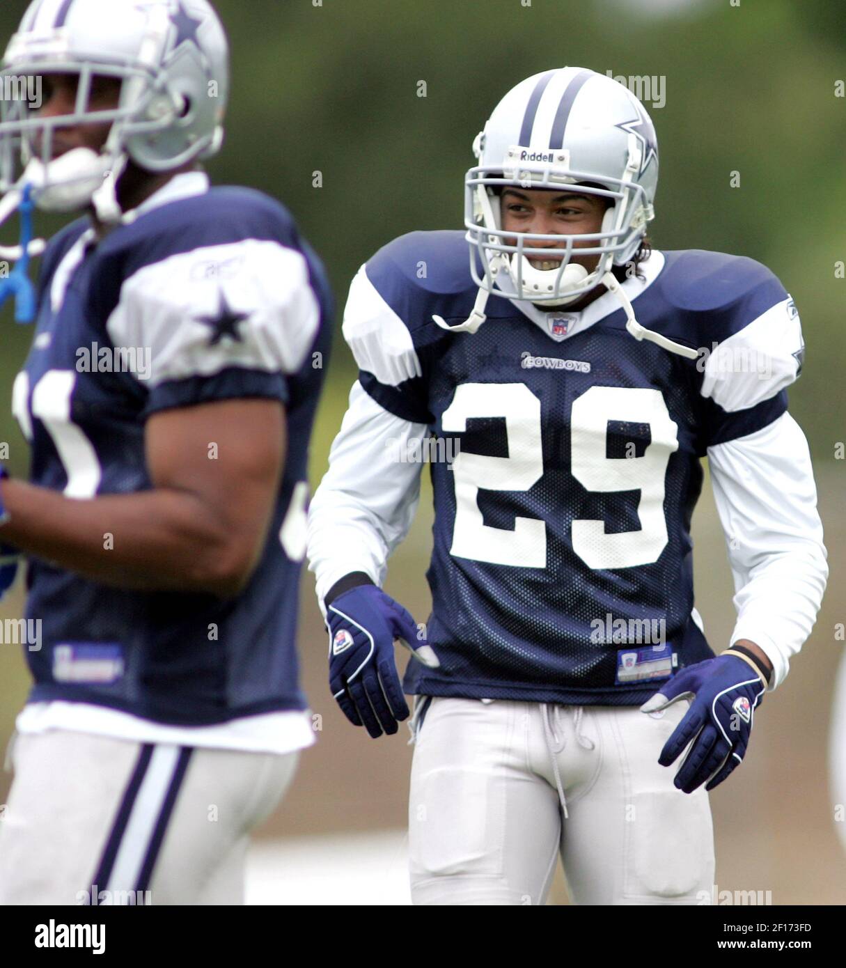 Safety Keith Davis (right) smiles as the Dallas Cowboys opened training ...