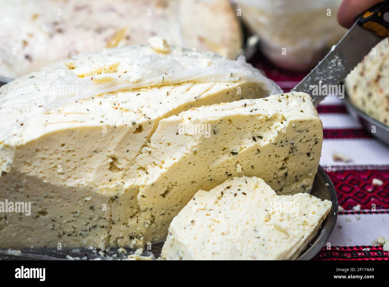 Pieces of cheese with spices Stock Photo - Alamy
