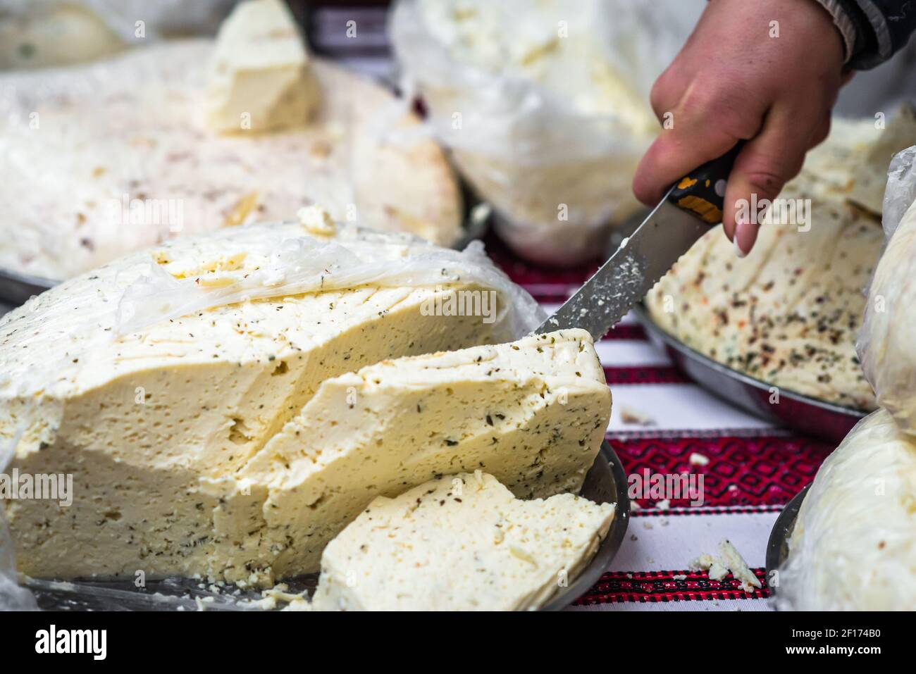 Pieces of cheese with spices Stock Photo - Alamy
