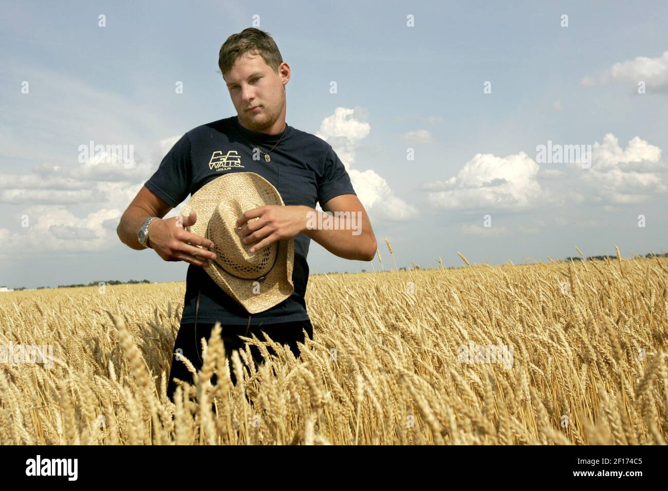 Steve Arends, 21, who only recently began walking again, stands in the ...