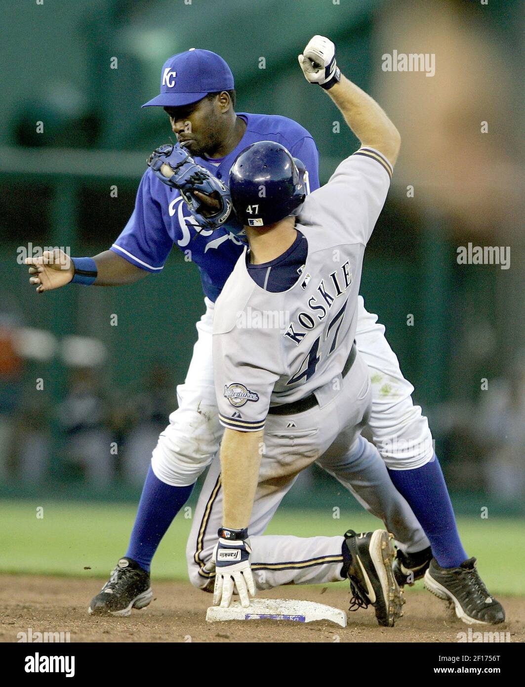 Kansas City Royals' Angel Berroa (4) tags out Milwaukee Brewers' Corey ...
