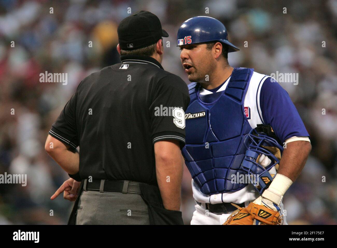 Texas Rangers catcher Gerald Laird disagrees with a call by umpire ...