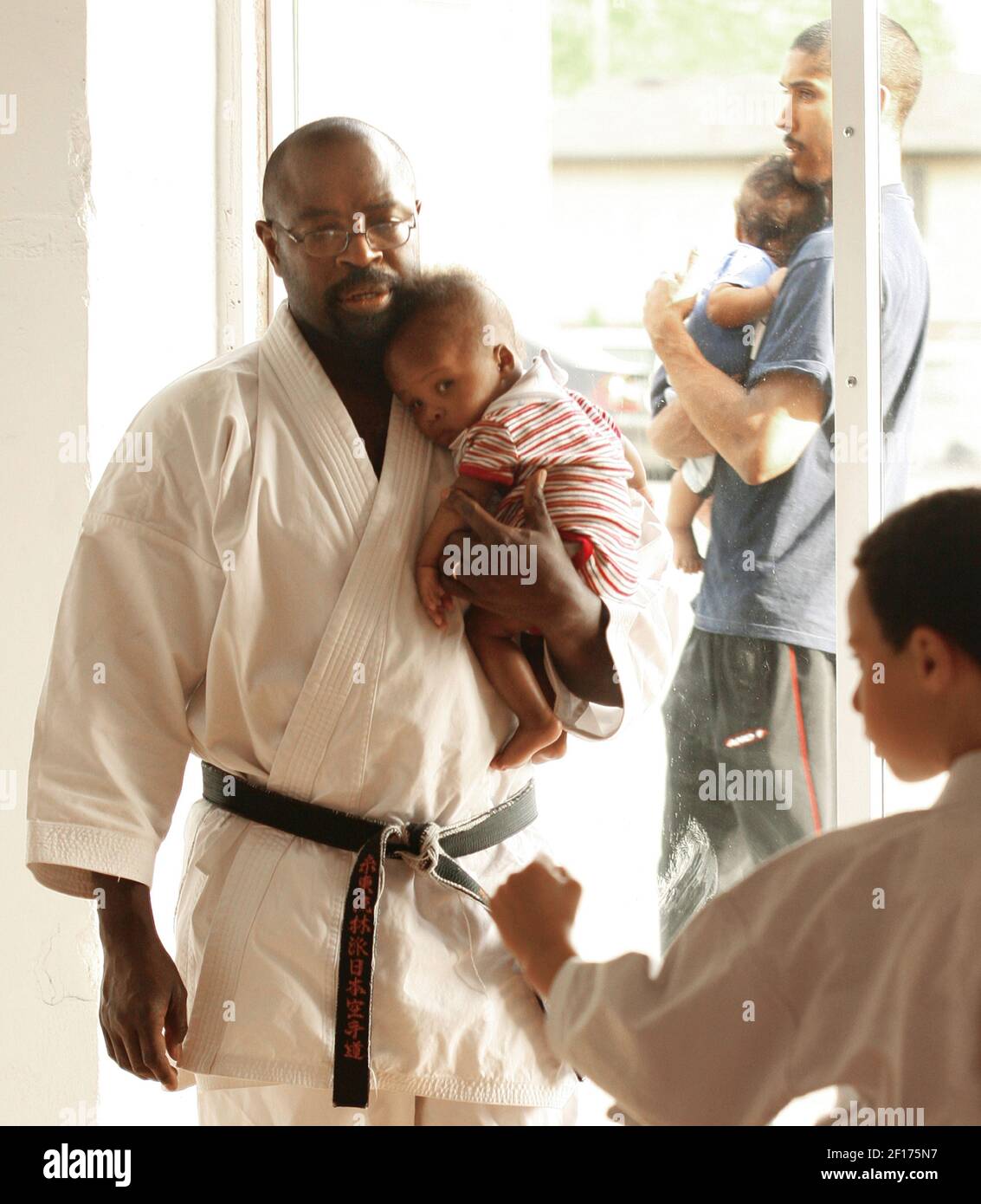 In his roles as father, karate sensei and social worker, Clifton ...