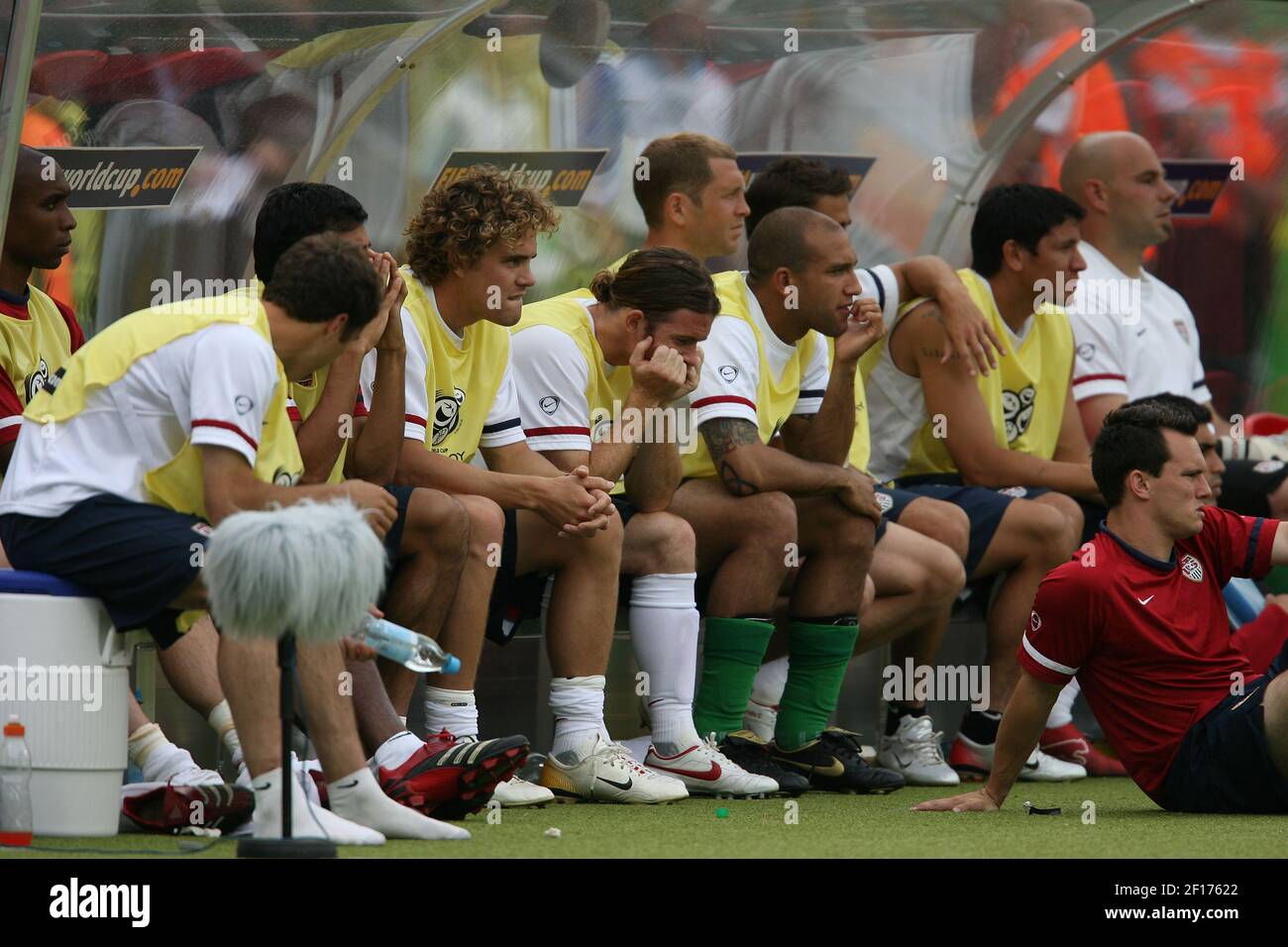 Team USA sits dejected after losing to Ghana 2-1 in the World Cup, June ...