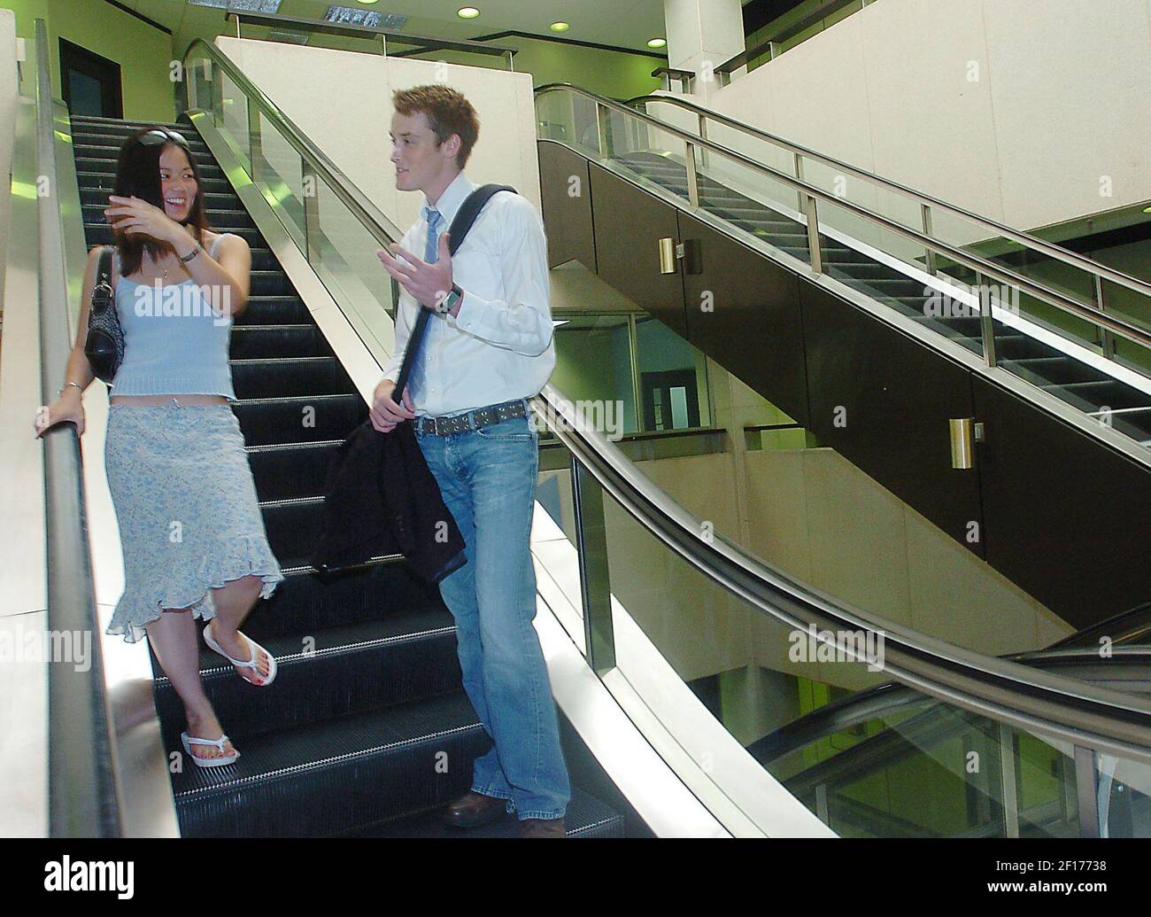 Interns Brandon Smith, right, and Diana Ni model inappropriate clothing ...