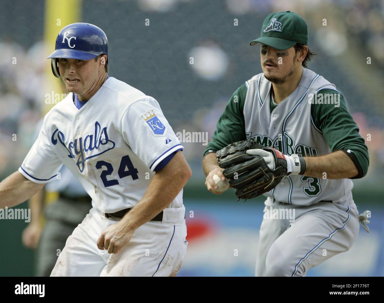 Tampa Bay Devil Rays second baseman Jorge Cantu (3) runs down the ...
