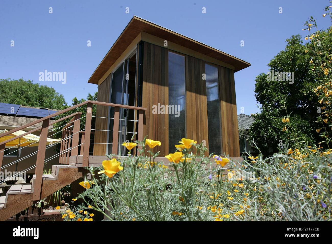 A side view of a cedar wood cabana in the backyard of a home in San ...