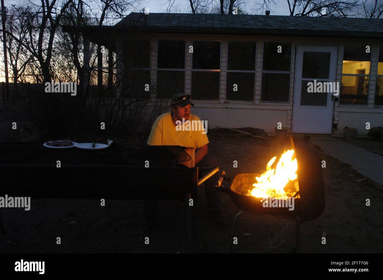 Brian Wyka cooks dinner at Chico Basin Ranch on April 13, 2006. Brian ...