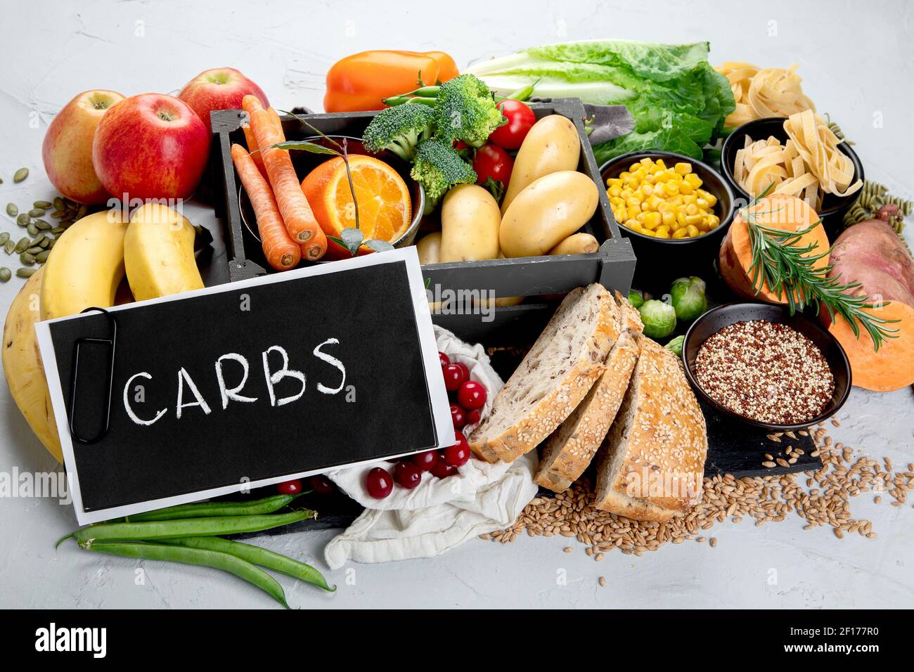 Best sources of carbs on light gray background. Healthy food concept ...